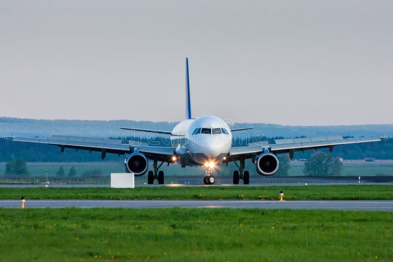 Front View of the Passenger Airliner with Boarding Ramp Isolated on ...