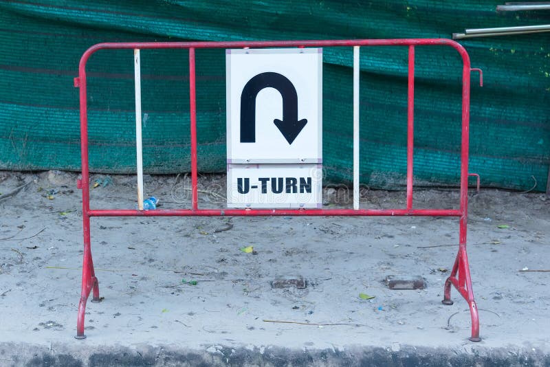 U-turn Sign on the Roadblock.Thailand. Stock Image - Image of direction ...