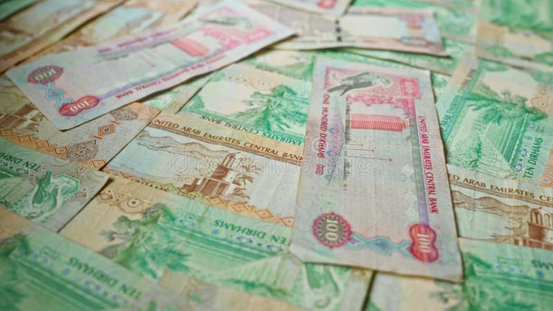 Uae Banknotes Featuring Various Denominations of Dirhams Scattered ...