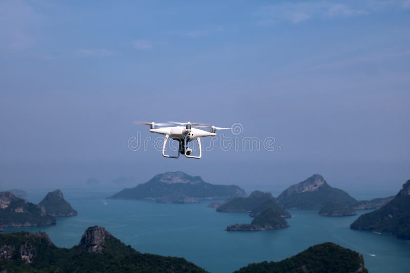 UAV or Drone Camera Fly Up from the Hands into the Blue Sky with Stock ...
