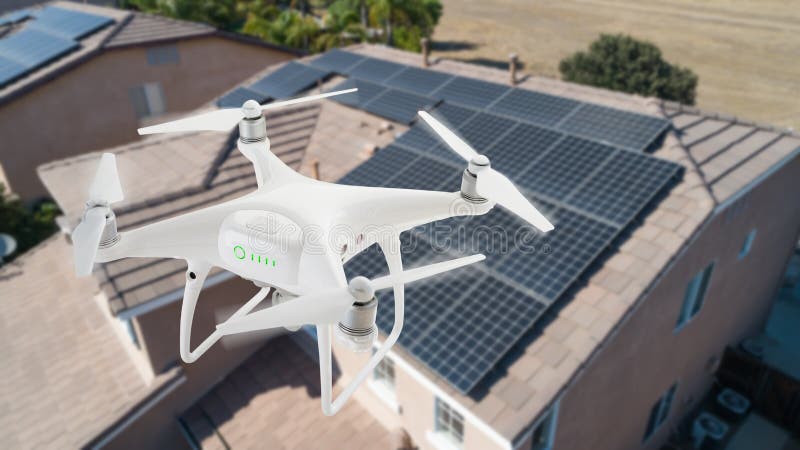 UAV Drone Inspecting Solar Panels on Large Home Rooftop Stock Photo ...