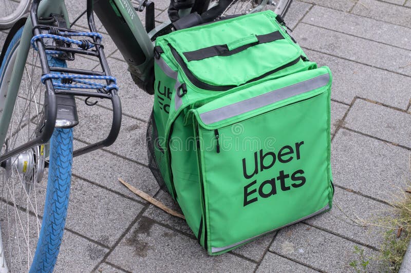 Uber Eats Bag at a Bicycle at Amsterdam the Netherlands 10-7-2024 ...