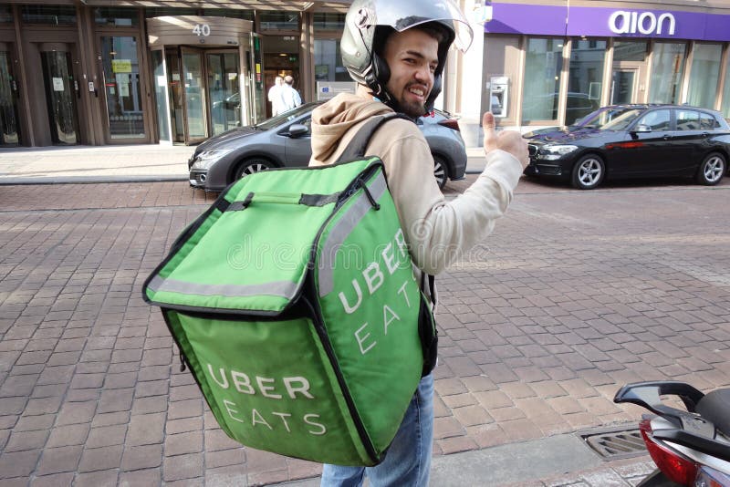 Uber Eats delivery man editorial photography. Image of eats - 168888122