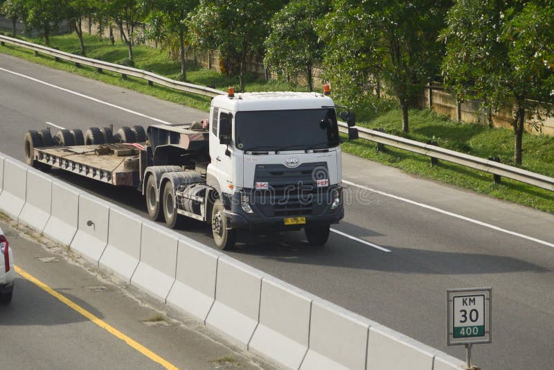 UD Trucks Quester Semi Truck with Dolly Trailer Editorial Photo - Image ... UD Trucks Quester Semi Truck with Dolly Trailer Editorial Photo - Image ...