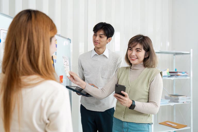 UI Designer and UX Developer Brainstorm Idea To Design the Application ...