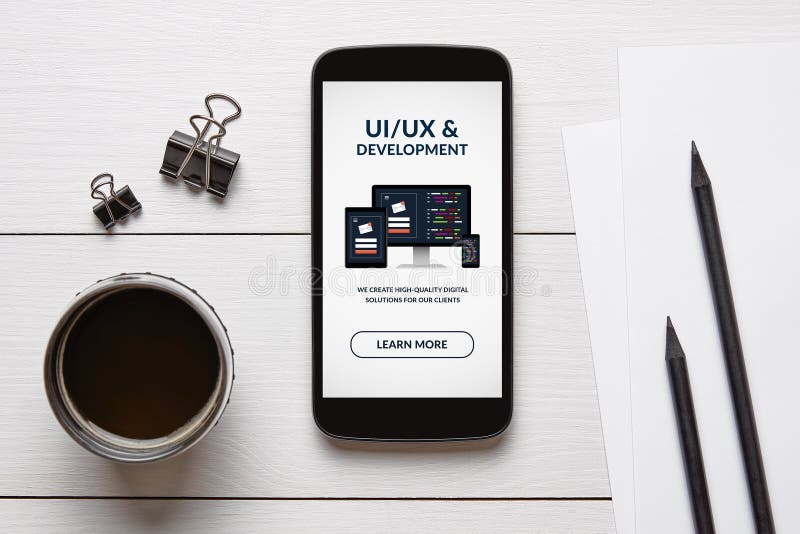 UI/UX Design and Development Concept on Laptop Screen on Wooden Table ... UI/UX Design and Development Concept on Laptop Screen on Wooden Table ...