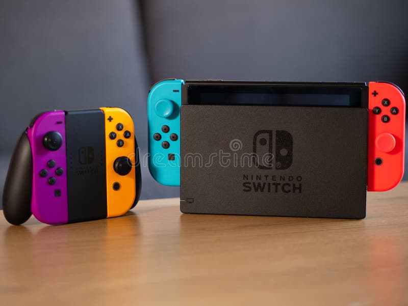 UK - Feb 2020: Nintendo Switch Neon Joy Con Controllers and Portable ...