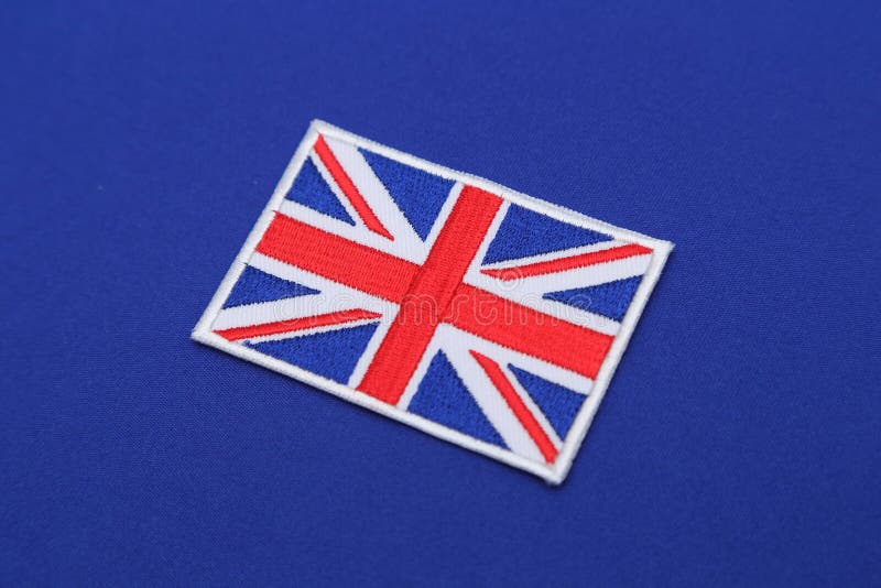 Uk flag patch on abric stock photo. Image of national - 76857824