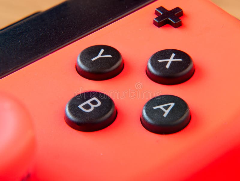 UK, March 2020: Close Up of Red Neon Joy Con Controller Nintendo Switch ...