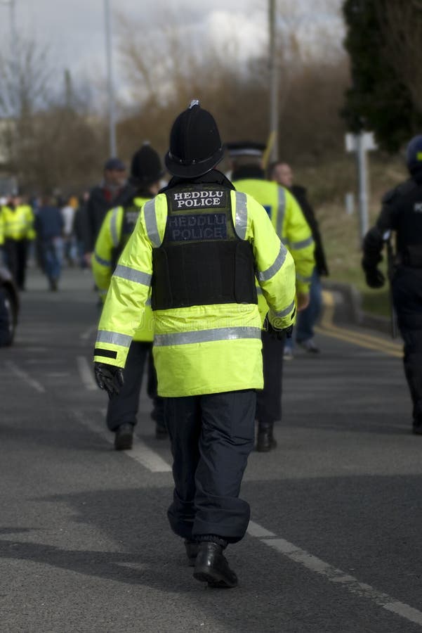 Uk Police Officers in Riot Gear Stock Image - Image of bobby, helmets ...
