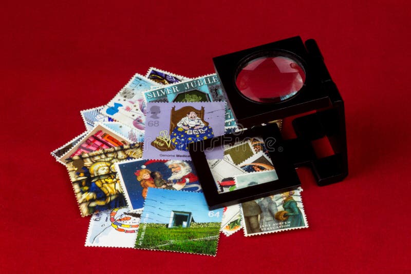 UK Stamps and Magnifier on a Red Table Cloth Editorial Image - Image of ...