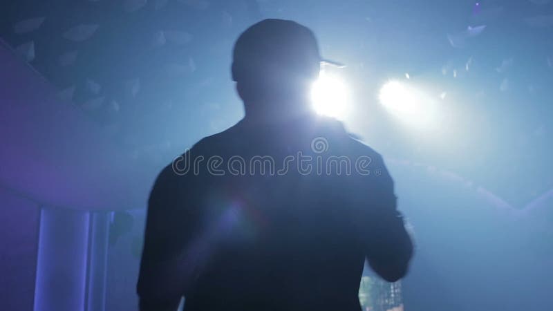 A Black Rapper on Stage. Cheering Crowd. View from the Audience ...