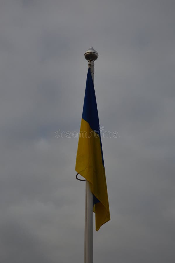 Ukraine Flag Hanging on a Flagpole without Wind Stock Photo - Image of ...