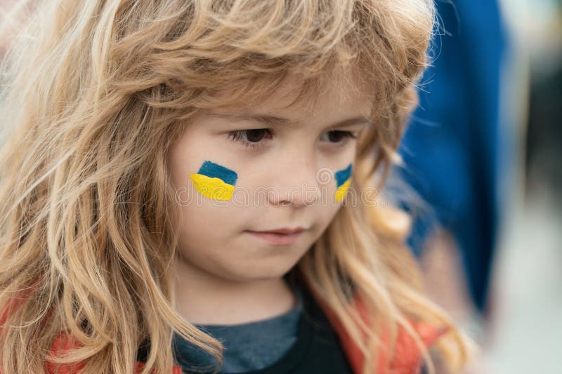 Ukraine Flag on Kids Cheek. World Stand with Ukraine. Stock Image ...