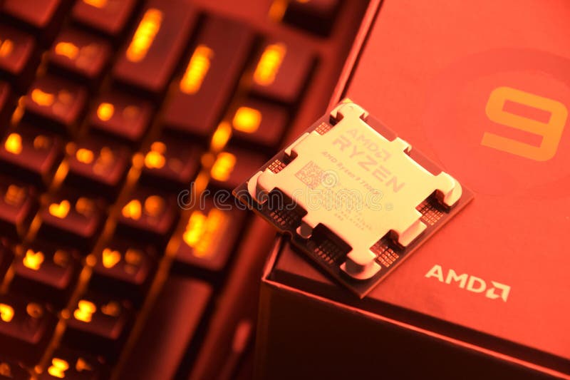 A Close-up of an AMD Ryzen 9 7900X Processor in a Packaging Box with ...