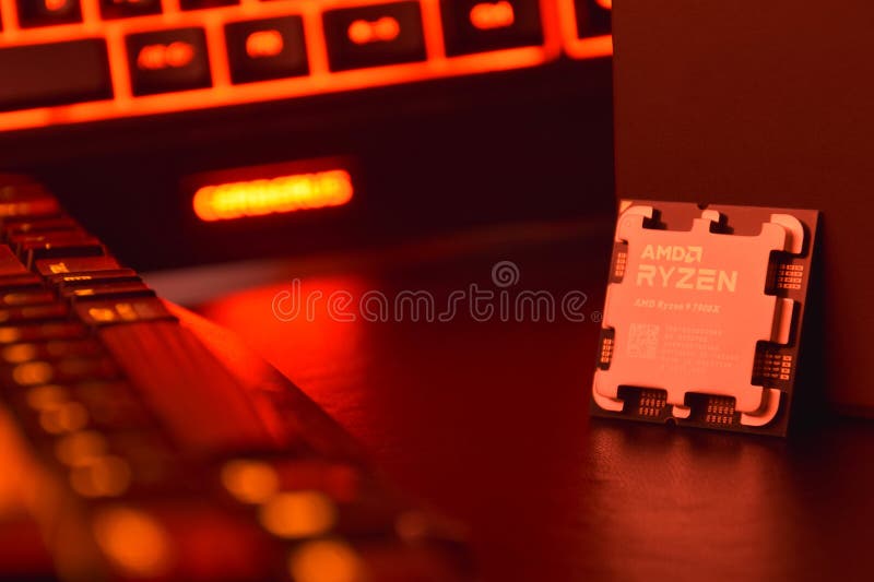 A Close-up of an AMD Ryzen 9 7900X Processor in a Packaging Box with ...