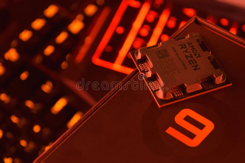 A Close-up of an AMD Ryzen 9 7900X Processor in a Packaging Box with ...