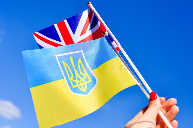 Ukrainian and British Flags in the Blue Sky Close Up Stock Image ...