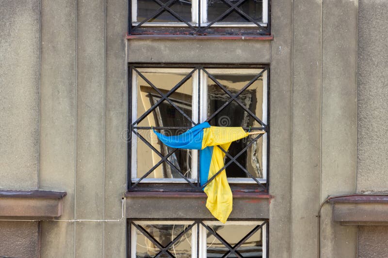 Ukrainian Flag Wound on a Lattice in Front of the Windows in the ...
