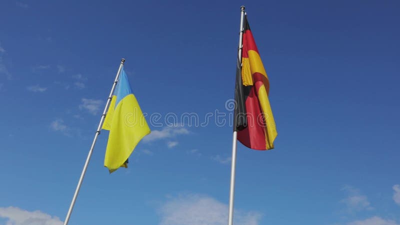 Ukrainian and German Flag on Sky Background. Stock Footage - Video of ...