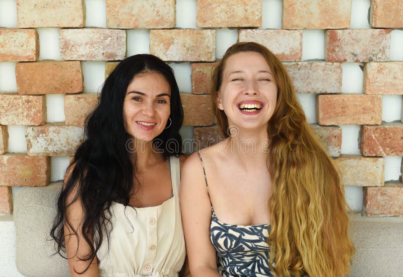 Ukrainian Woman Brunette And Russian Woman Blonde Portrait Together