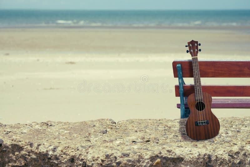 Ukulele on the beach. stock photo. Image of natural, beautiful - 75776772