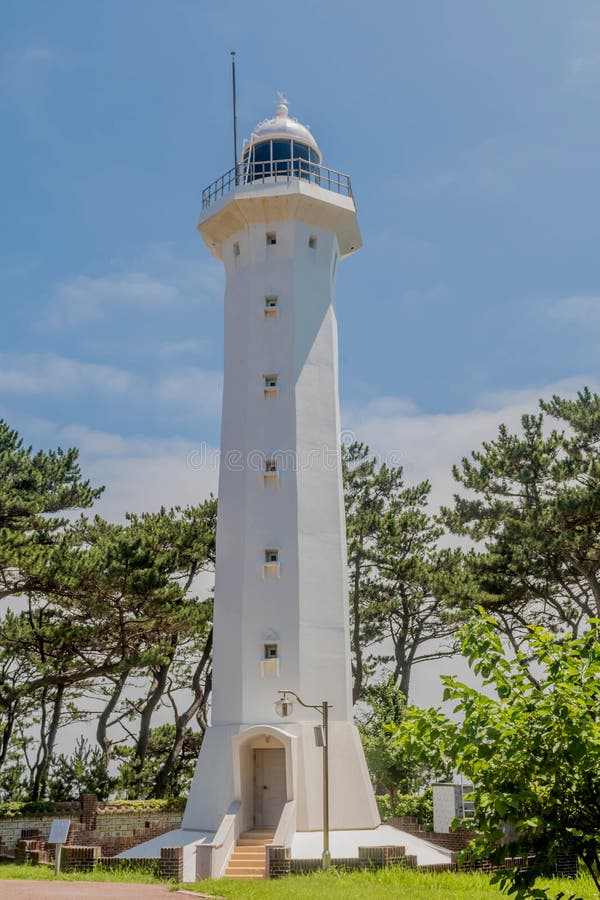 The Lighthouse and the Sea in Front of Porto Colom at Sunrise Stock ...