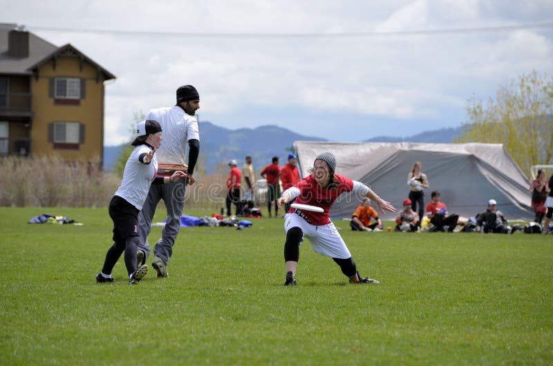 Ultimate Frisbee Throw editorial stock photo. Image of gender - 19830358
