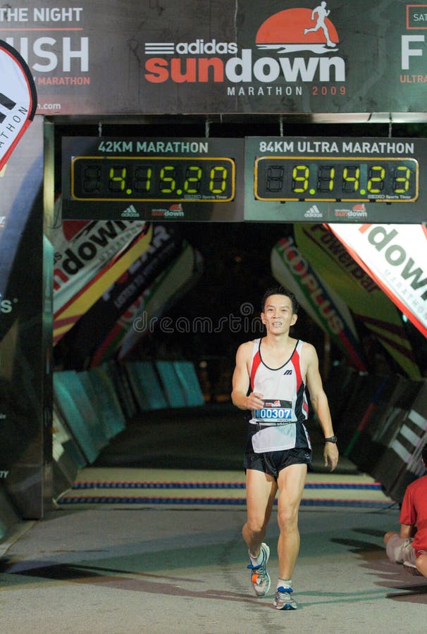 Ultra Marathoner Crossing Finish Line Editorial Photo - Image of board ...