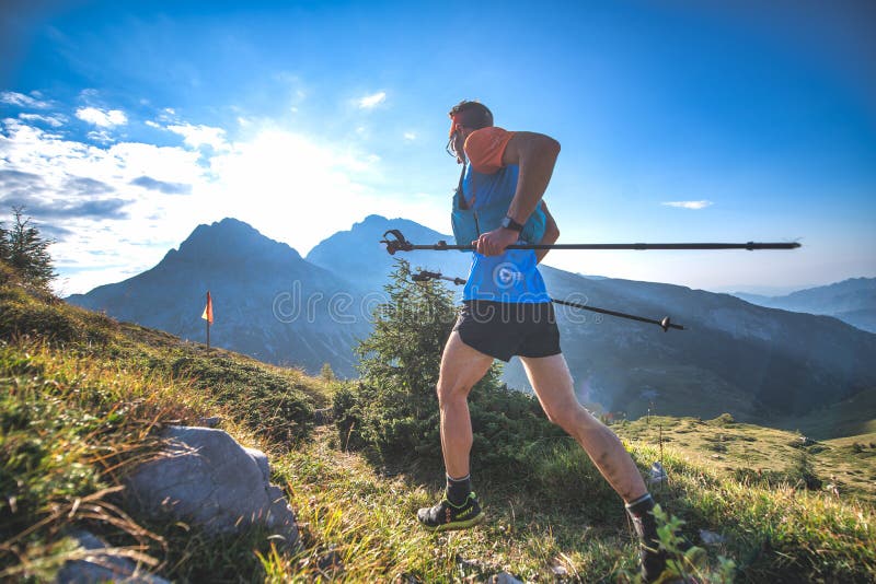 Ultra Trail Running in the Mountains. an Athlete on a Trail Editorial ...