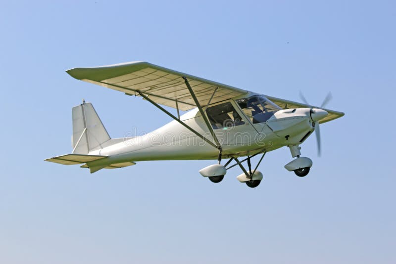 Ultralight Airplane Flying in a Blue Sky Stock Photo - Image of ...