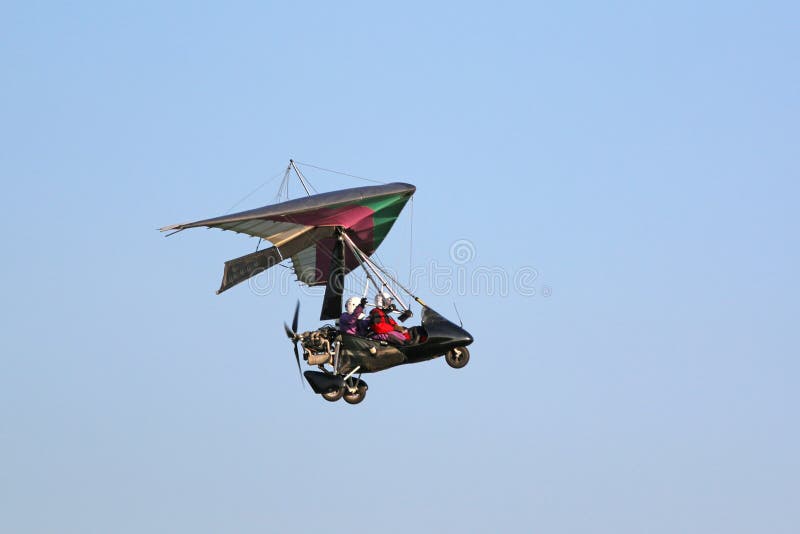 Ultralight Airplane Flying in a Blue Sky Stock Photo - Image of blue ...