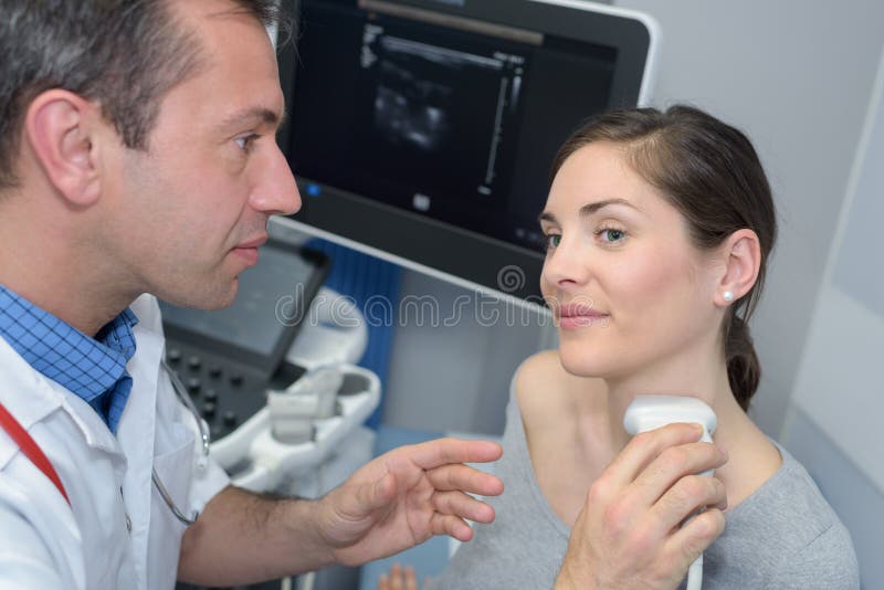 Ultrasound in the neck stock photo. Image of patient - 127168796