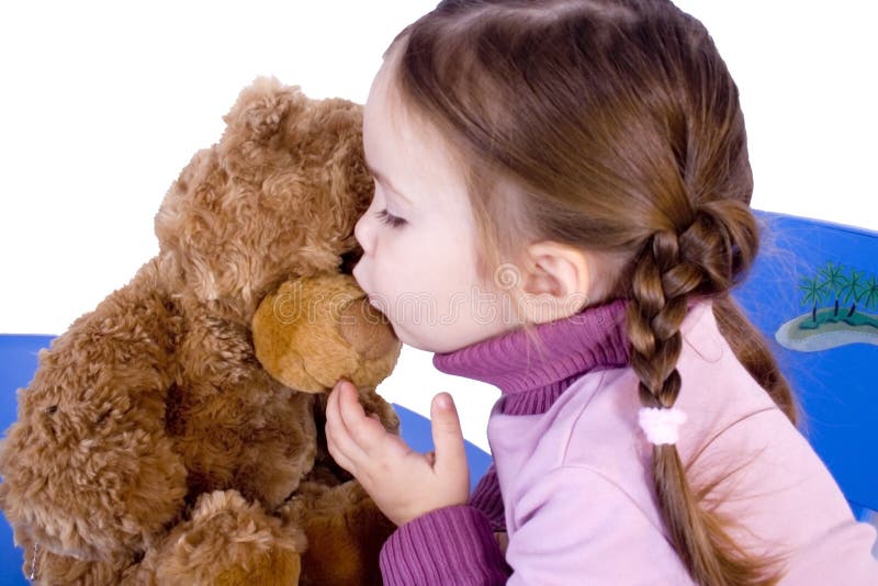 Um Bebé Doce Beija Sua Peluche Foto de Stock - Imagem de beijo, povos ...