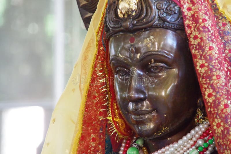 Uma Devi Statue at WatMuang. Stock Photo - Image of angthong, antique ...