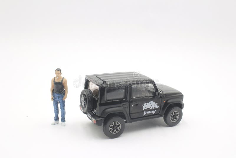 Uma Escala De Jipes Com a Figura Foto Editorial - Imagem de brinquedo ...