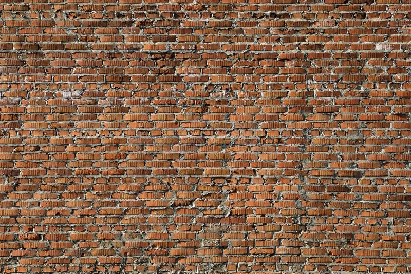 Uma Textura De Parede De Tijolos Picante Como Fundo Foto De Stock