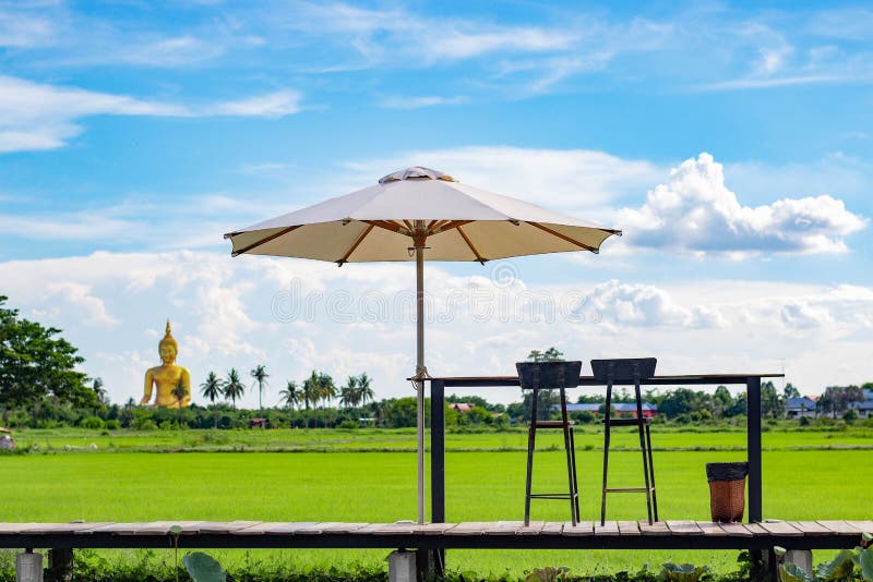 Umbrella and Coffee Table at Rice Field Stock Image - Image of isolated ...