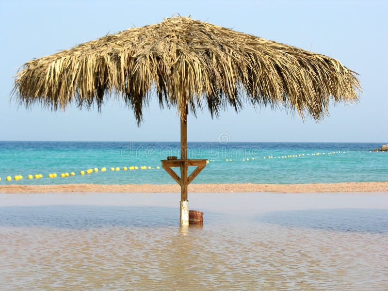 Umbrella on sea stock photo. Image of relaxation, coast - 447552