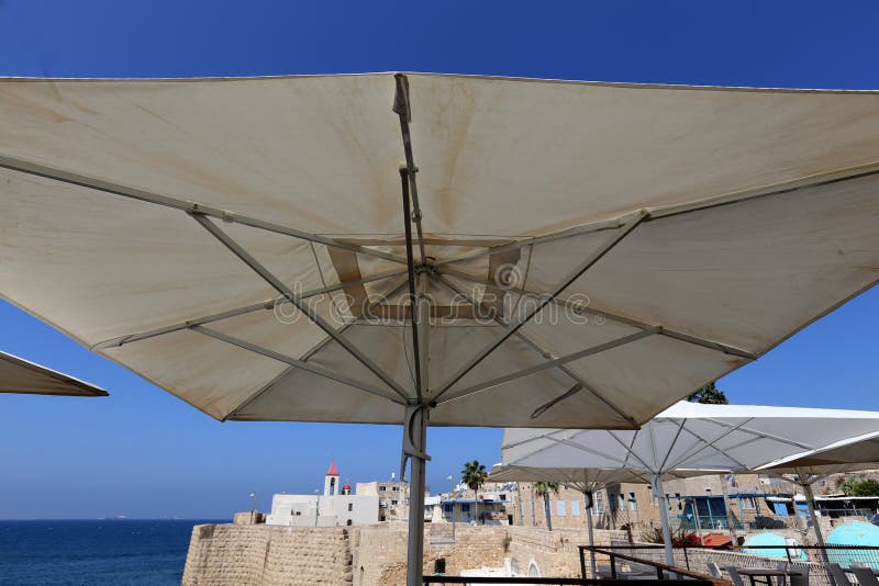 Umbrella by the sea stock image. Image of shade, nature - 128352737