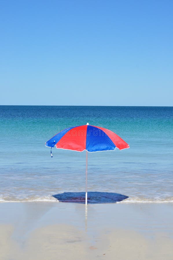 Umbrella by the sea stock image. Image of beach, nature - 34593313