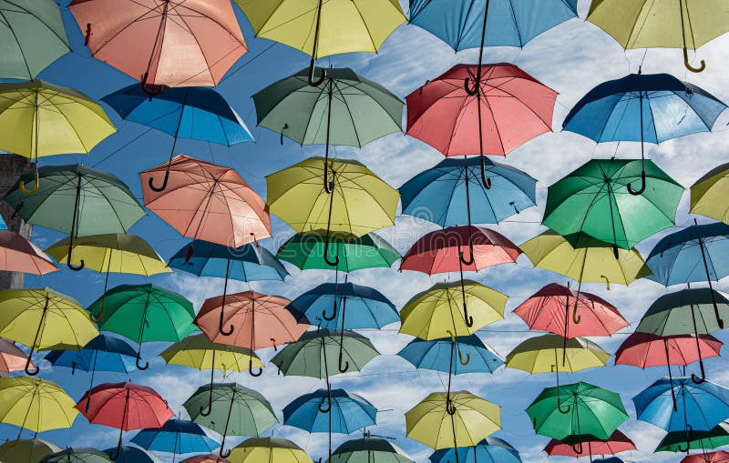 Umbrellas of Different Colors in the Sky Stock Photo - Image of book ...