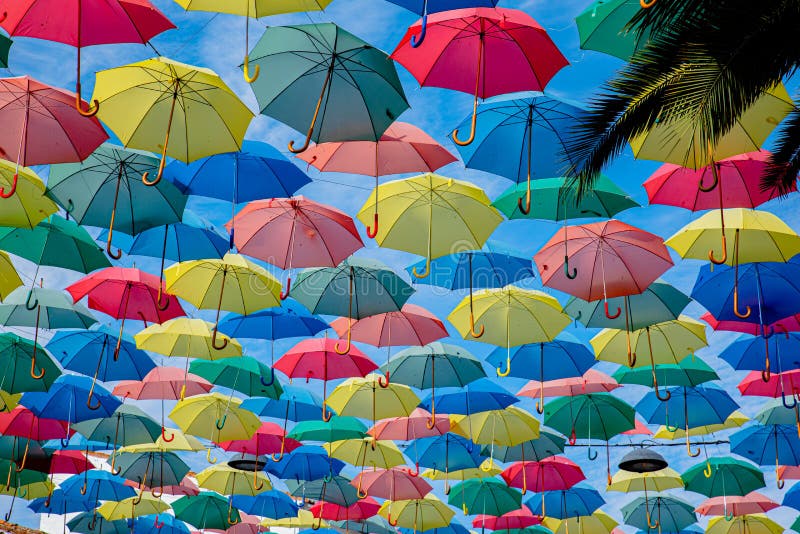 Umbrellas Floating in the Sky with Lots of Color Stock Photo - Image of ...