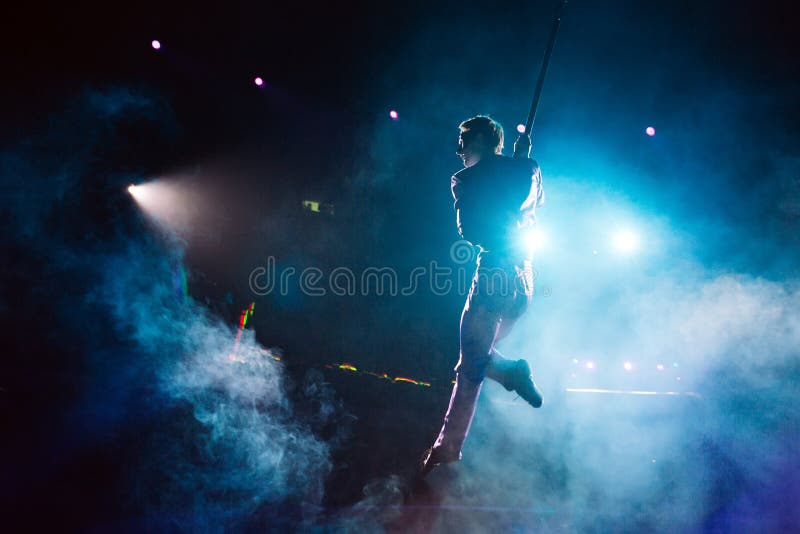 Aerial Acrobat in the Ring. a Young Girl Performs the Acrobatic ...