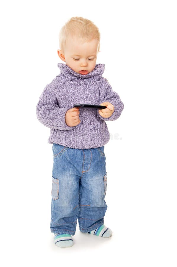 Il Ragazzino Guarda Nel Telefono Cellulare Immagine Stock - Immagine di ...