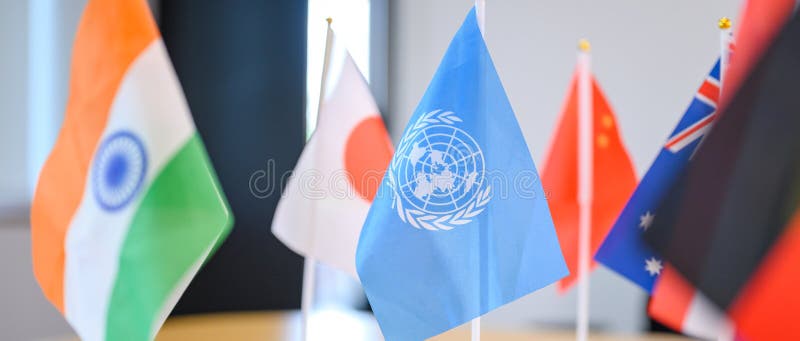 The UN Flag is on the Table Together with the Flags of Its Member ...