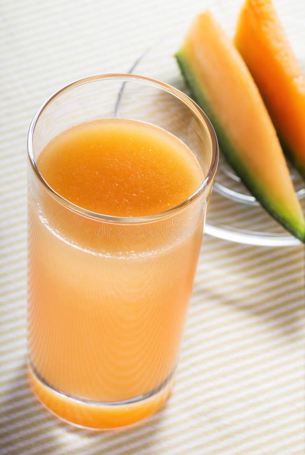 Un verre de jus de melon image stock. Image du boisson - 38835939