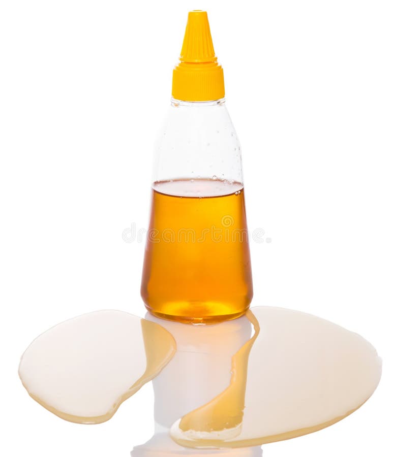Una Botella De La Miel Natural V Imagen de archivo - Imagen de fragante ...