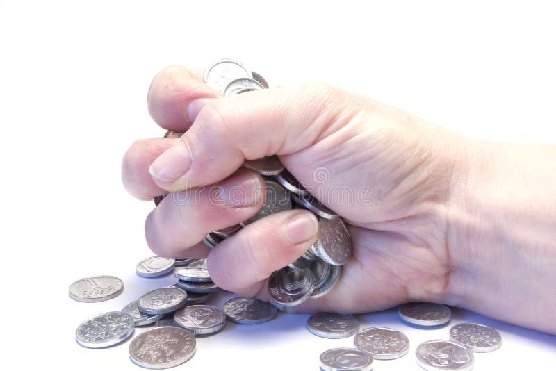 Una mano con monedas foto de archivo. Imagen de tacto - 5052802