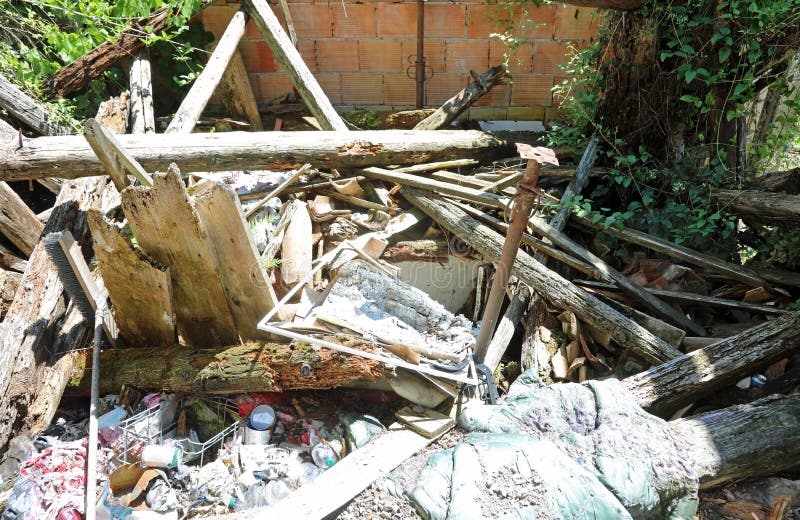 Unauthorized Rubbish Dump in the Abandoned House Full of Wasts Stock ...